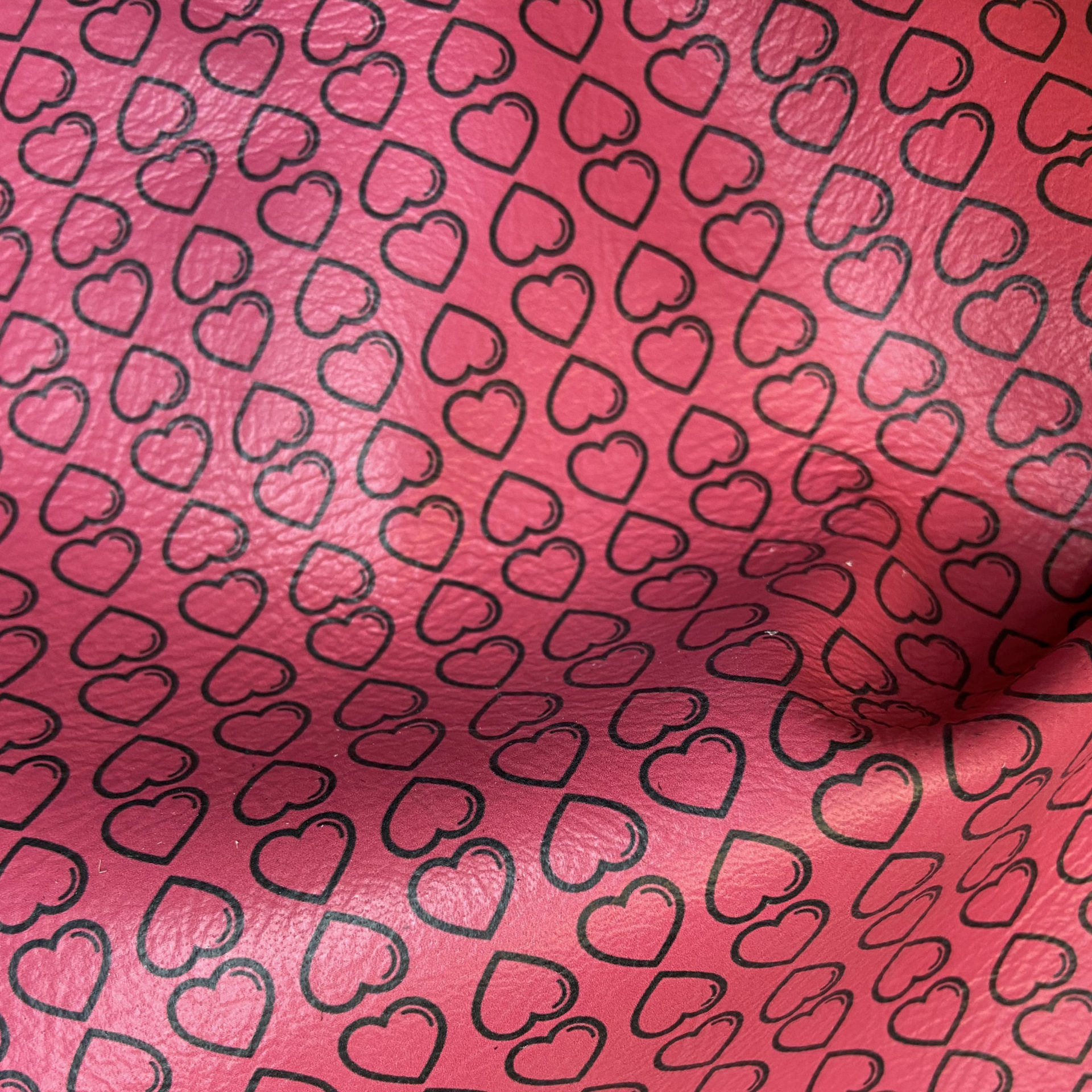 Small Black Hearts on Pink Background on White Leather - Rainbow Leather